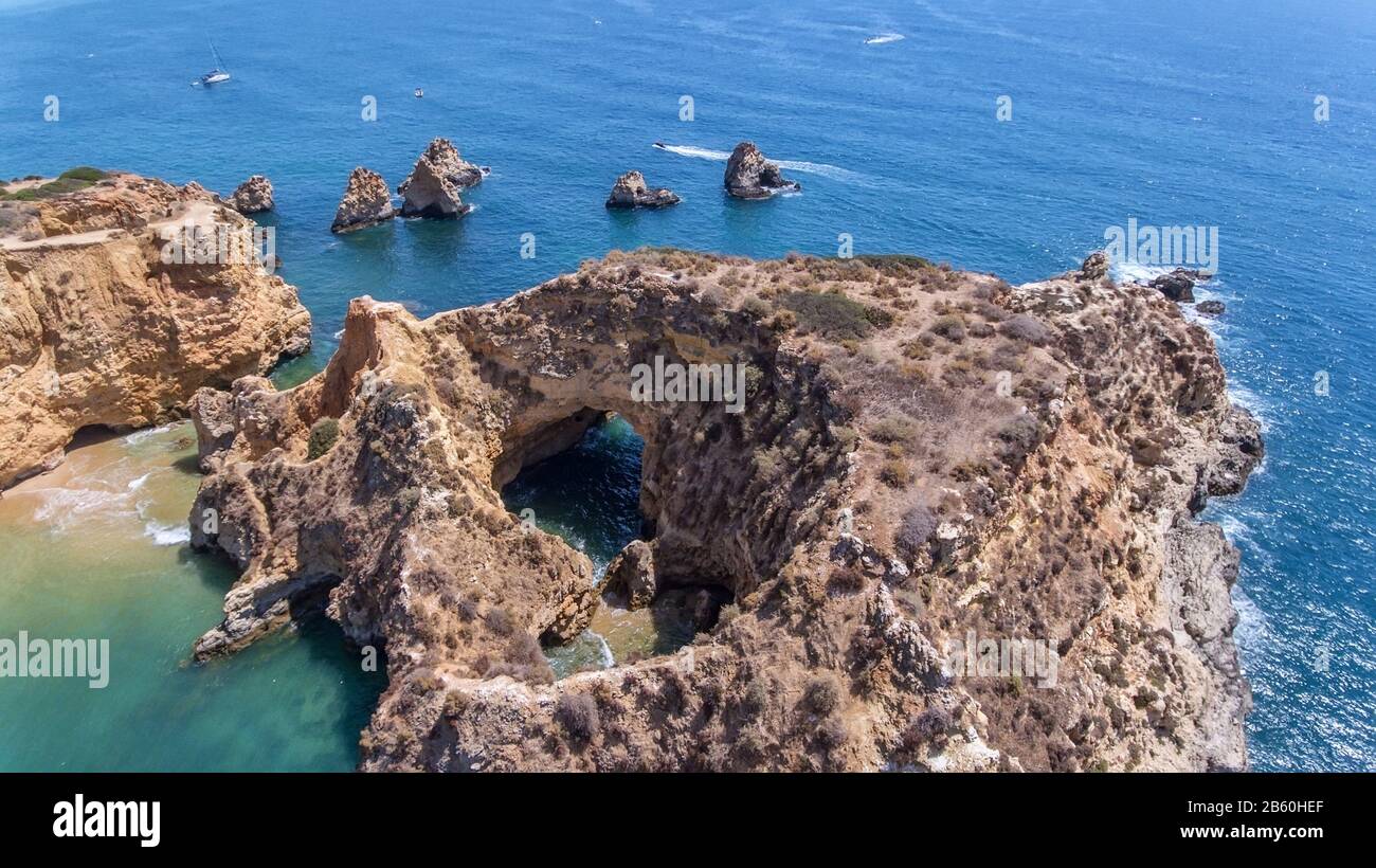 Aerial. Rocks and beaches near the beaches of Portimao Stock Photo - Alamy
