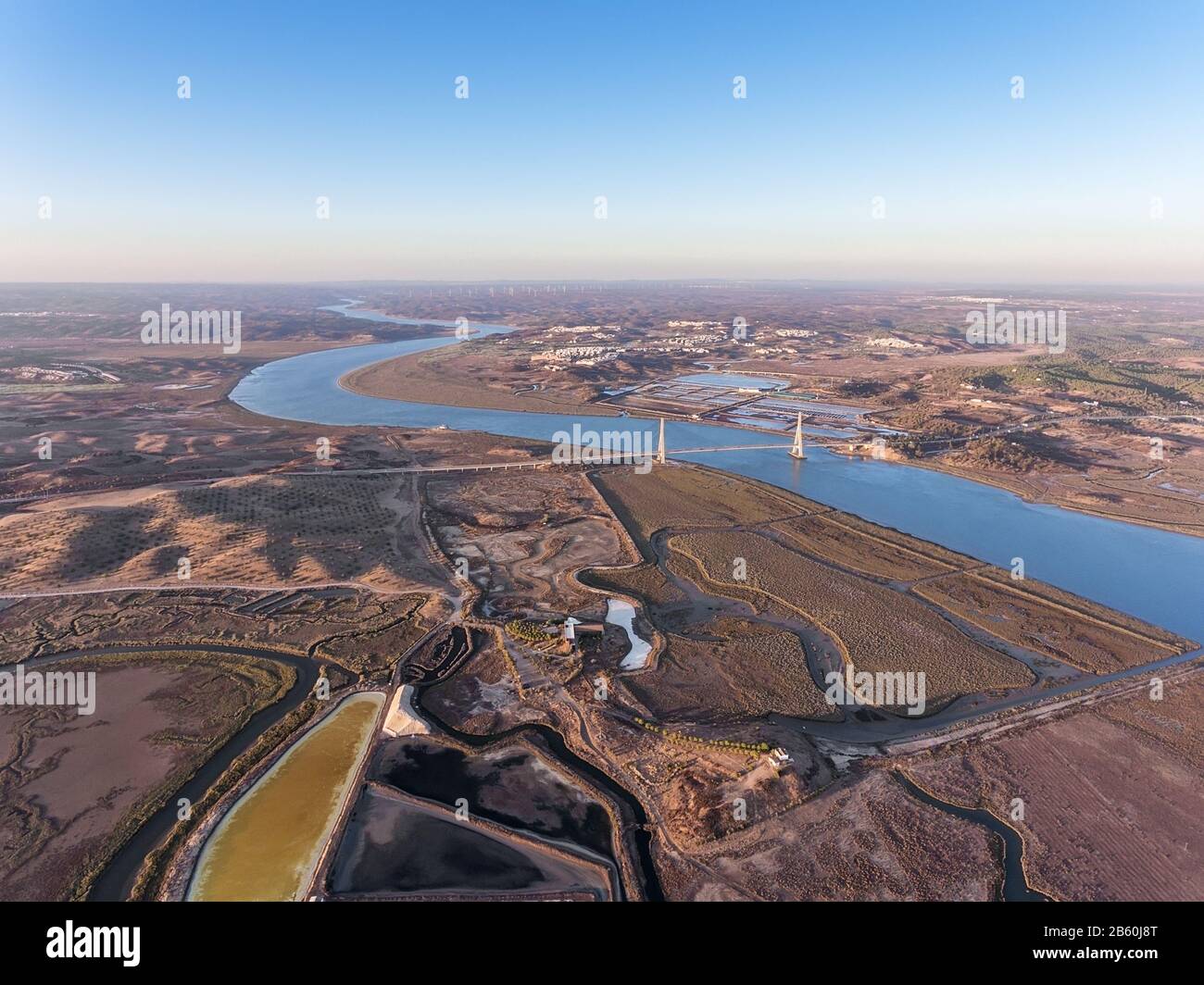 Aerial. Textured fields of swampy salt lakes. Salines of Portugal. Vila ...