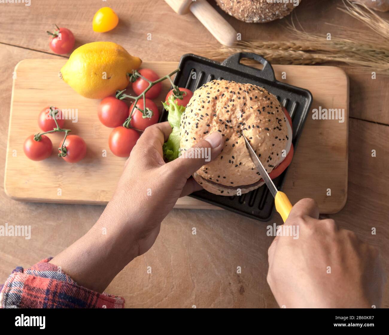 The butler chef use knife cutting hamburger homemade in kitchen. top ...