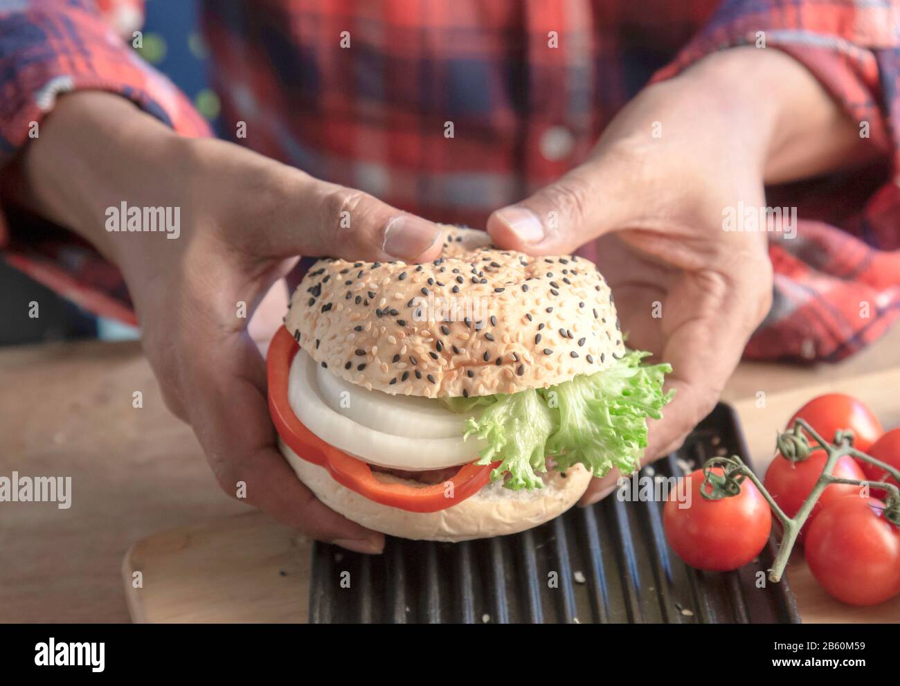 The butler chef making hamburger homemade in kitchen Stock Photo - Alamy