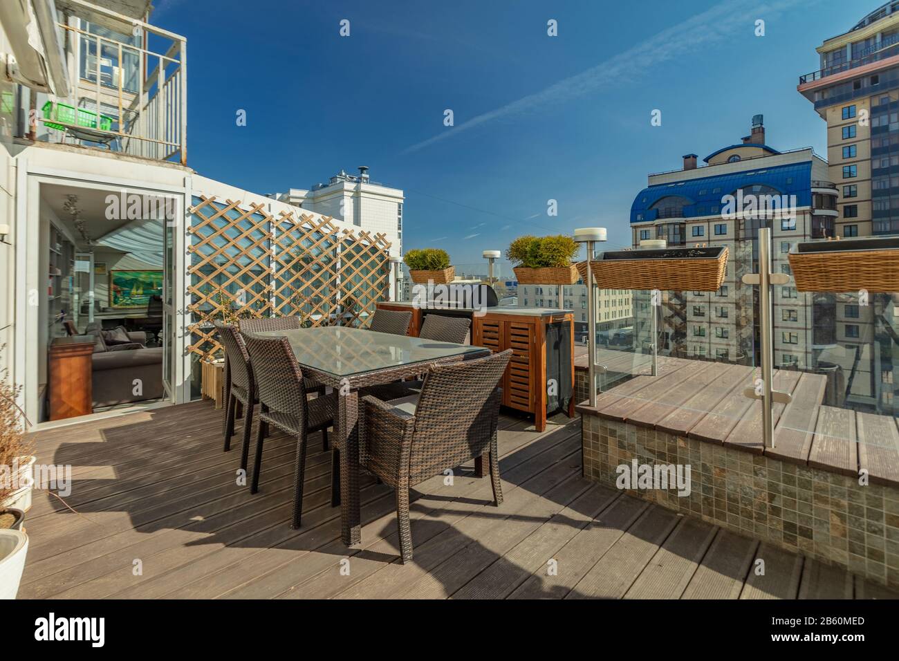 Personal terrace with table and chairs for outdoors leisure in modern ...