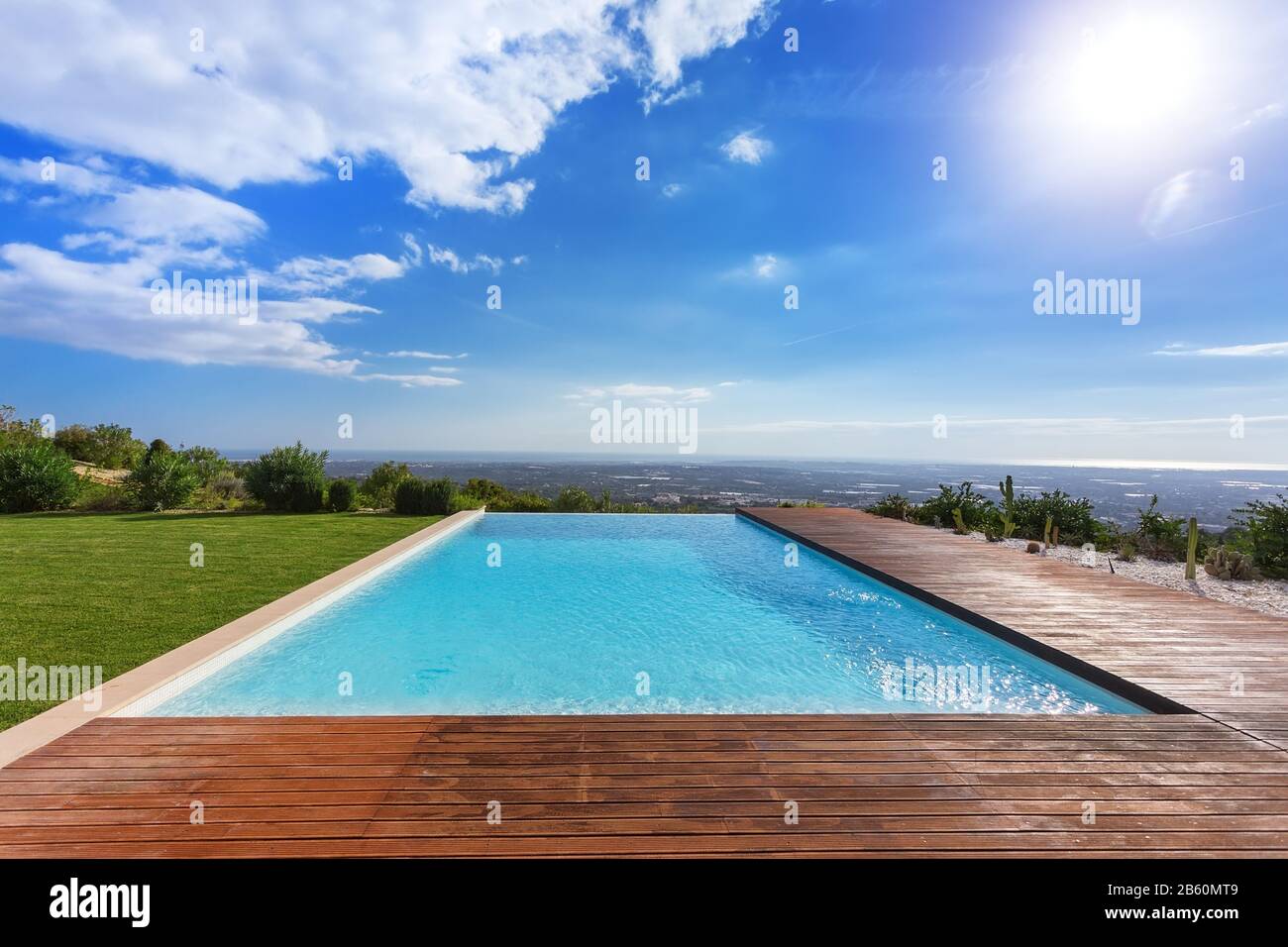 Modern endless infinity pool. With views of the landscape Stock Photo ...