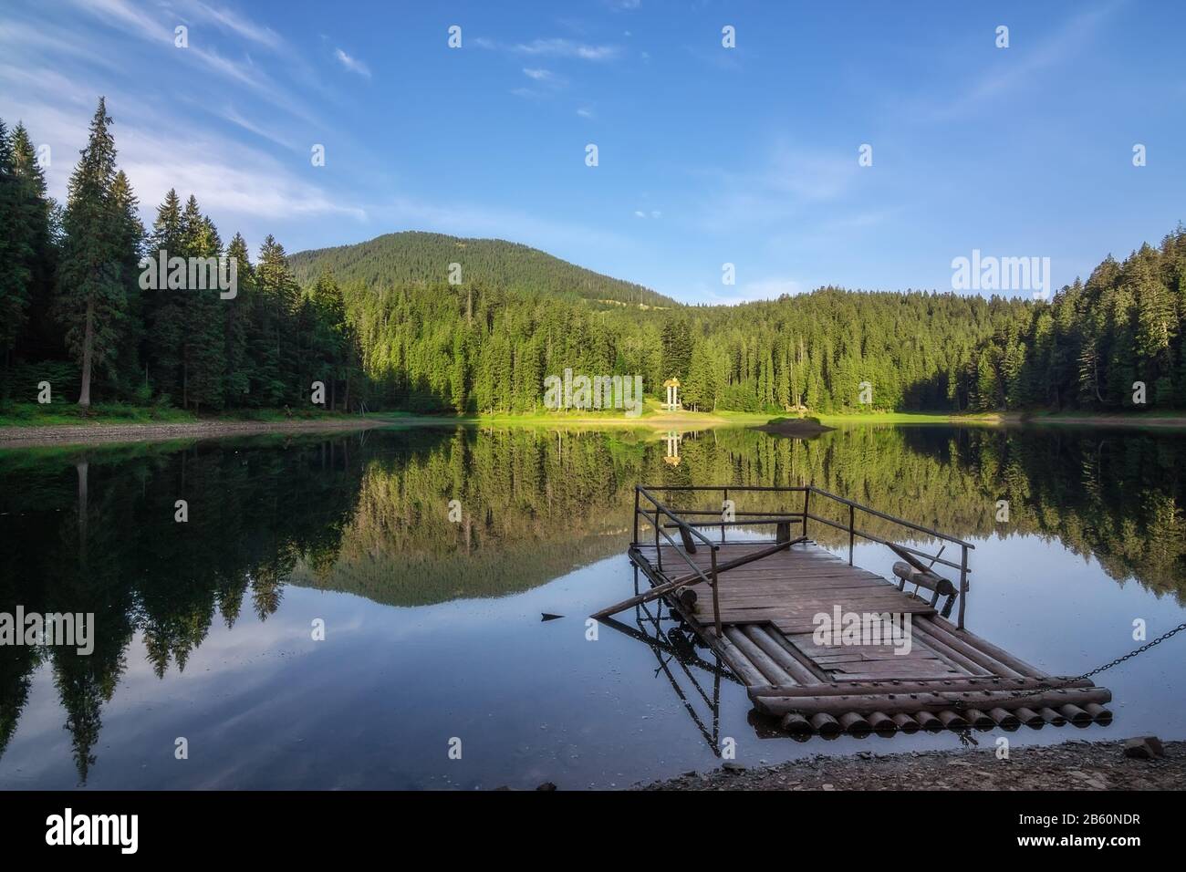 Old wooden raft for the crossing, in the Carpathians, the village of ...