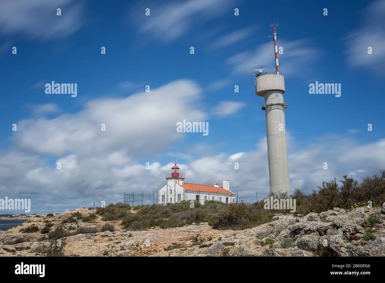 Modern lighthouse antenna orientation to the sea. Long exposure Stock ...