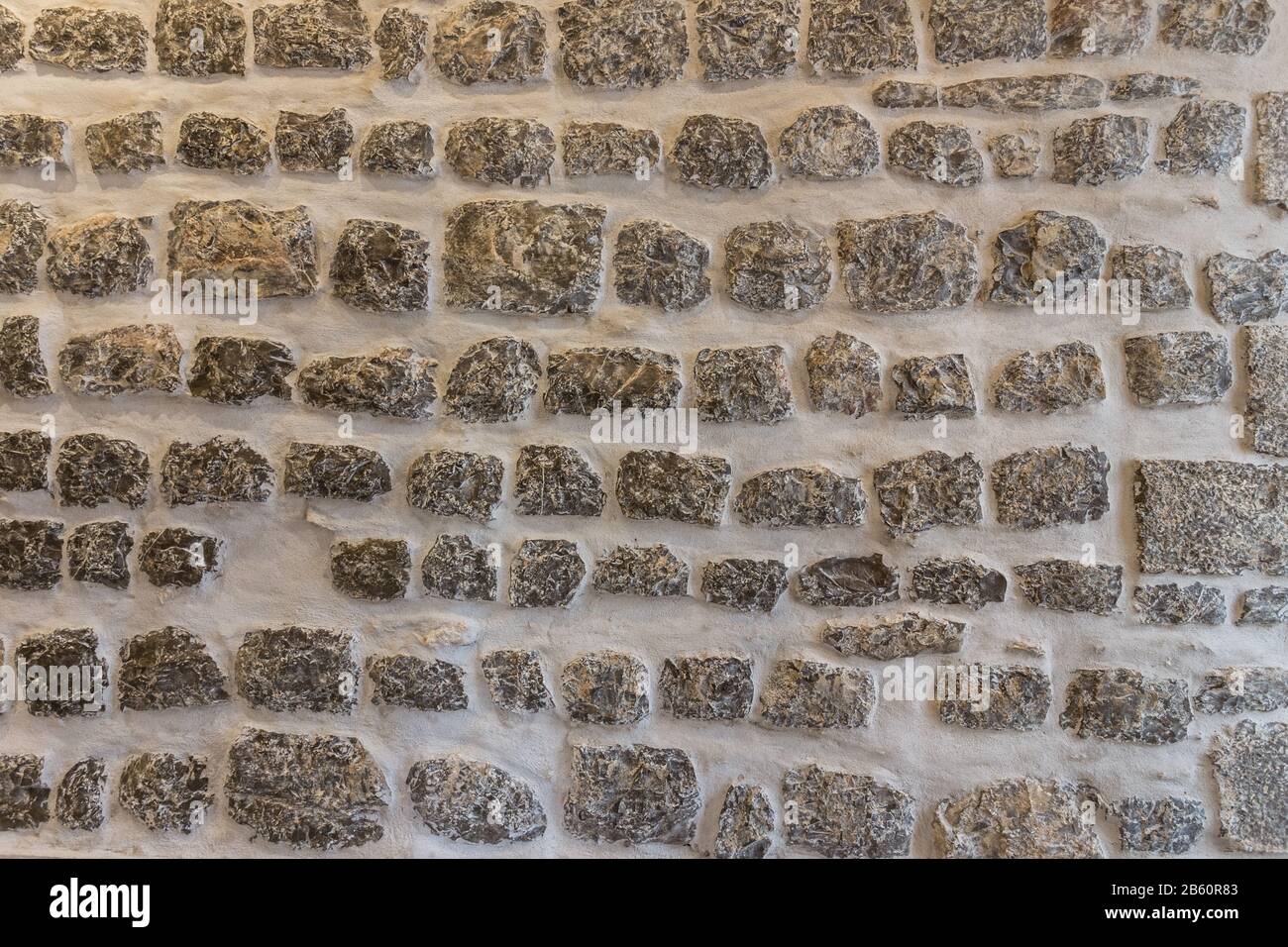 Horizontal stone wall texture close up. Lacquered Stock Photo - Alamy