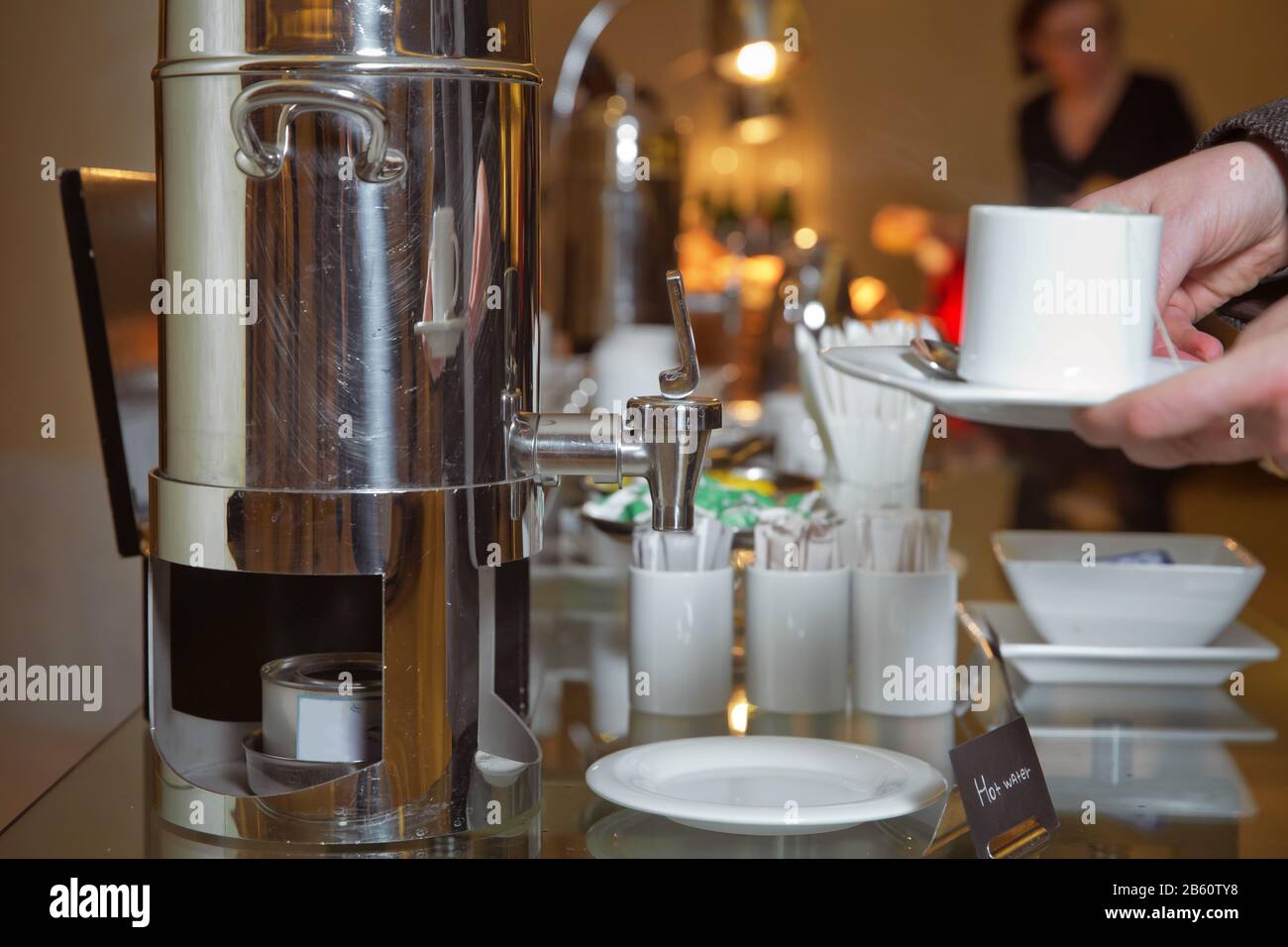 coffee espresso shot on a hand . Hand with fresh Black Coffee Pouring ...