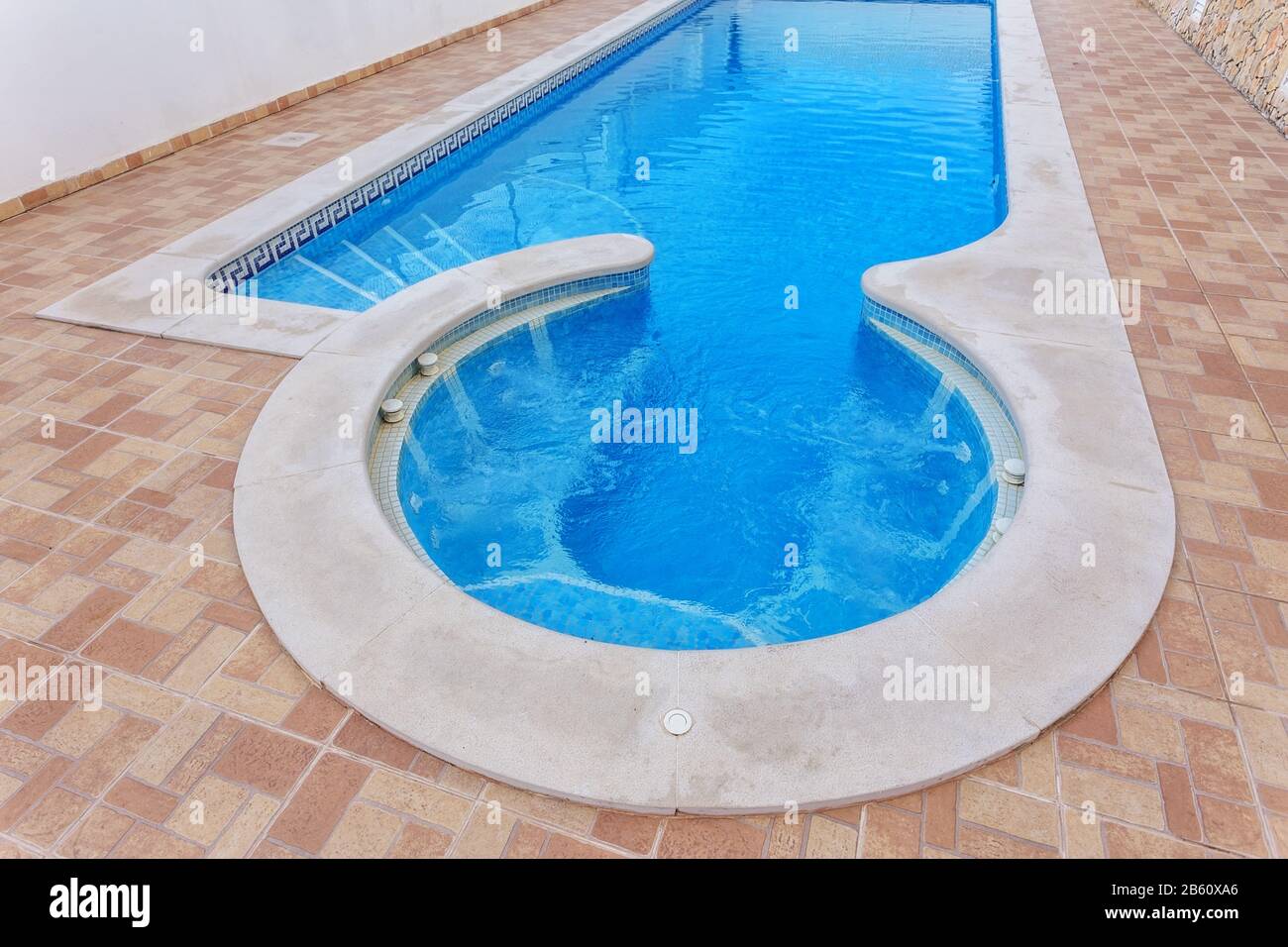 Jacuzzi built in the pool. Outdoors summer Stock Photo - Alamy