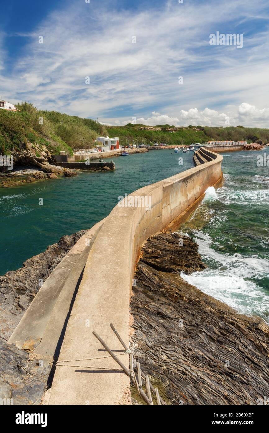 Long pier wall in the dock for ships of asylum. Portugal Mil Fontes ...