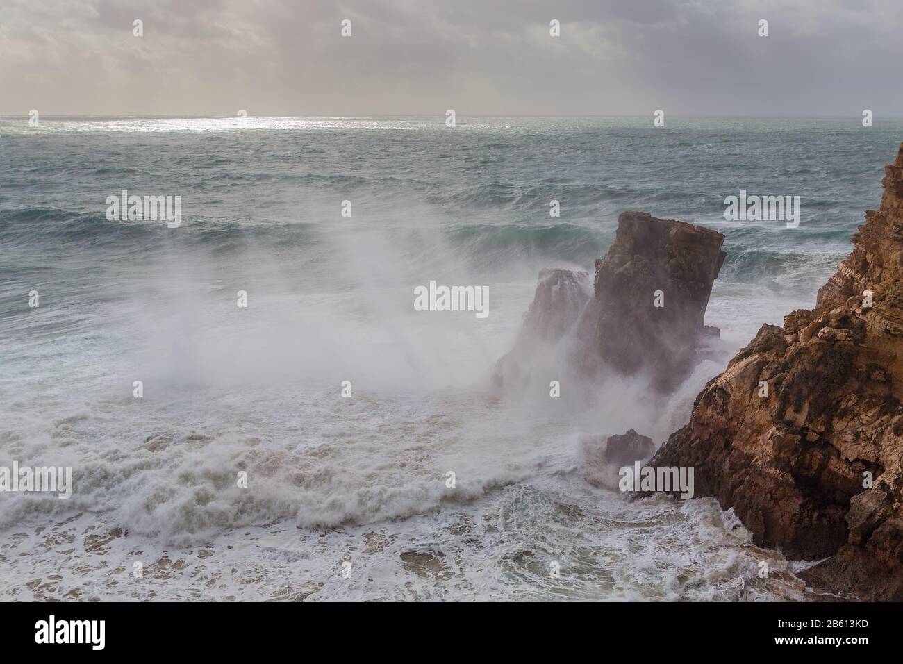 Were scattered wave on the rocks during a storm Stock Photo - Alamy