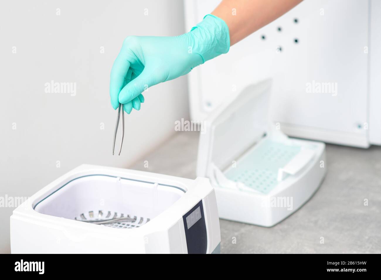 Hand cleans tweezers with cleaning systems for medical instruments ...