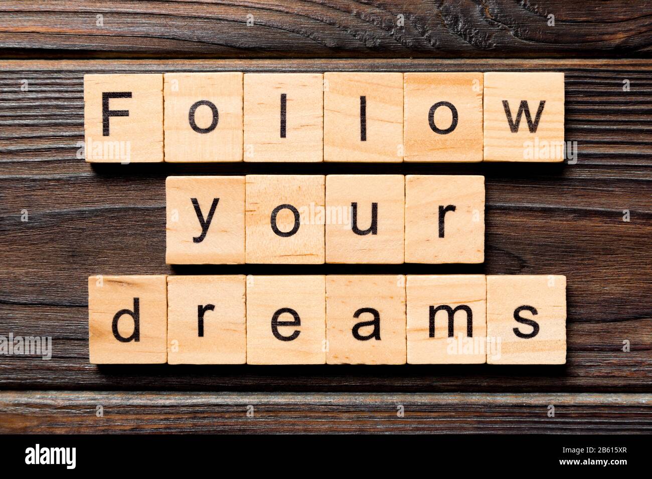 Follow your dreams word written on wood block. Follow your dreams text ... Follow your dreams word written on wood block. Follow your dreams text ...