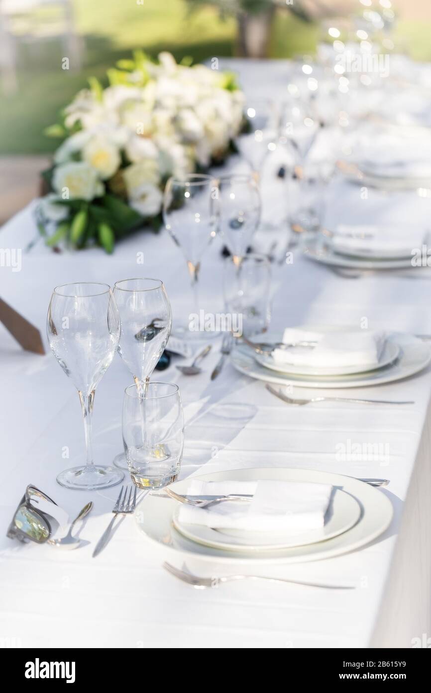 Wedding table decorations. Close-up. Flowers plates utensils Stock ...