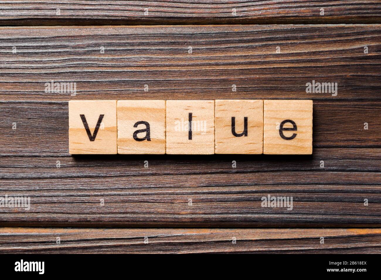 value word written on wood block. value text on table, concept Stock ...