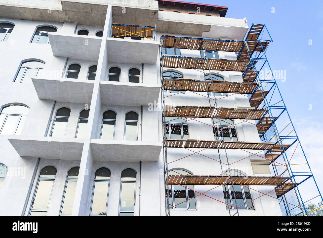 Extensive scaffolding for building a new house. Constraction of ...