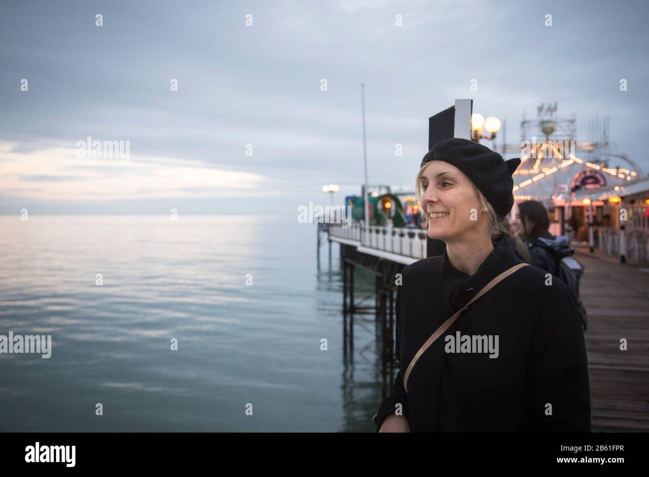 Woman At End Of Pier High Resolution Stock Photography and Images - Alamy