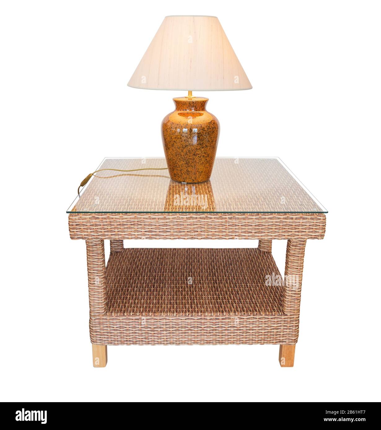 Straw table and lamp shades to decorate rooms. On the glass Stock Photo ...