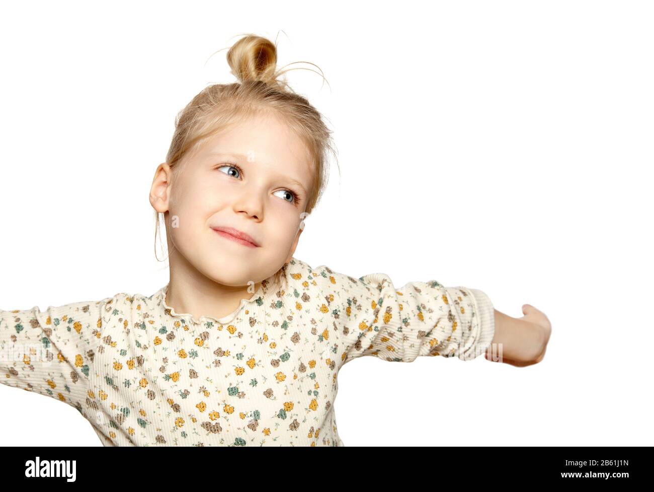 Studio portrait of cute dreaming girl on white background Stock Photo ...