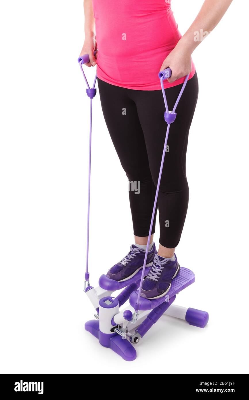 Girl on fitness training. Stepper and expanders Stock Photo - Alamy