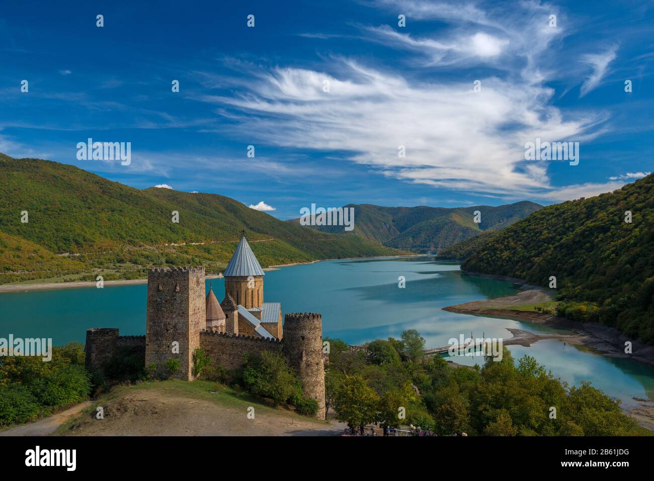 Medieval Ananuri complex: castle and church against azure lake and ...