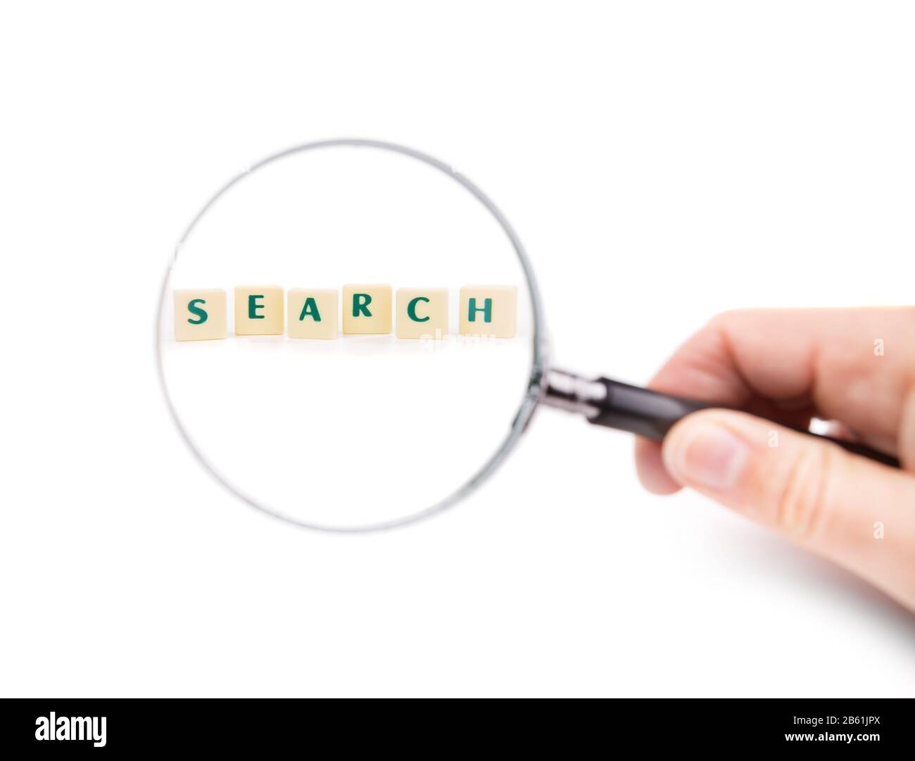 Magnifying glass in hand on the word search. On a white background ...