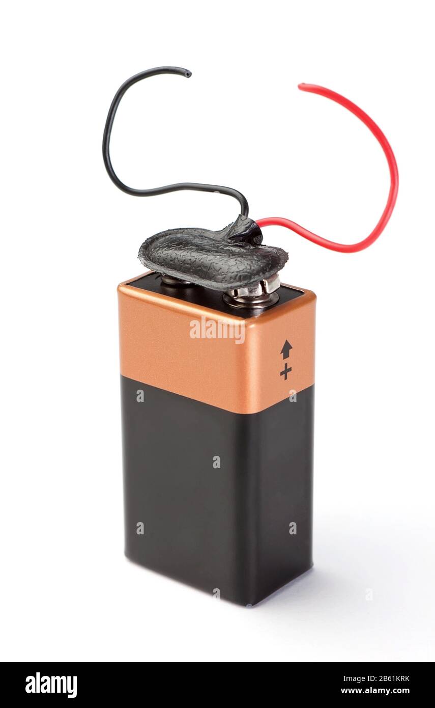 Battery-to-wire for charging. On a white background Stock Photo - Alamy