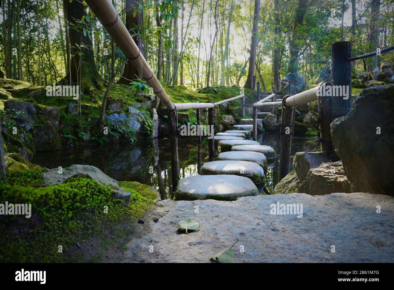 Take a walk through a stone bridge to nature Stock Photo - Alamy