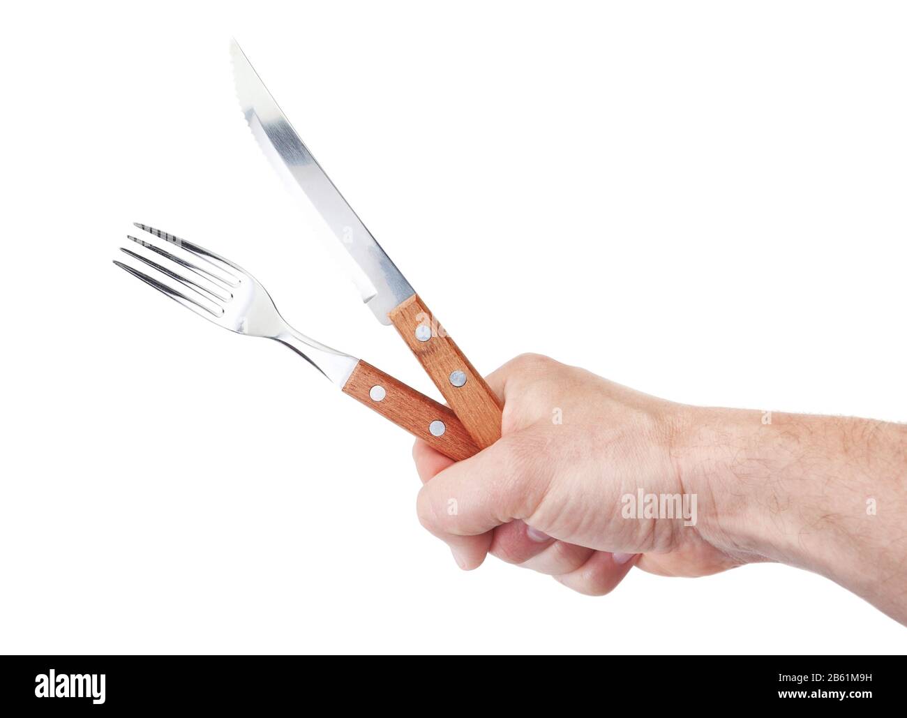 Cutlery for a restaurant in a man's hand. On a white background Stock ...