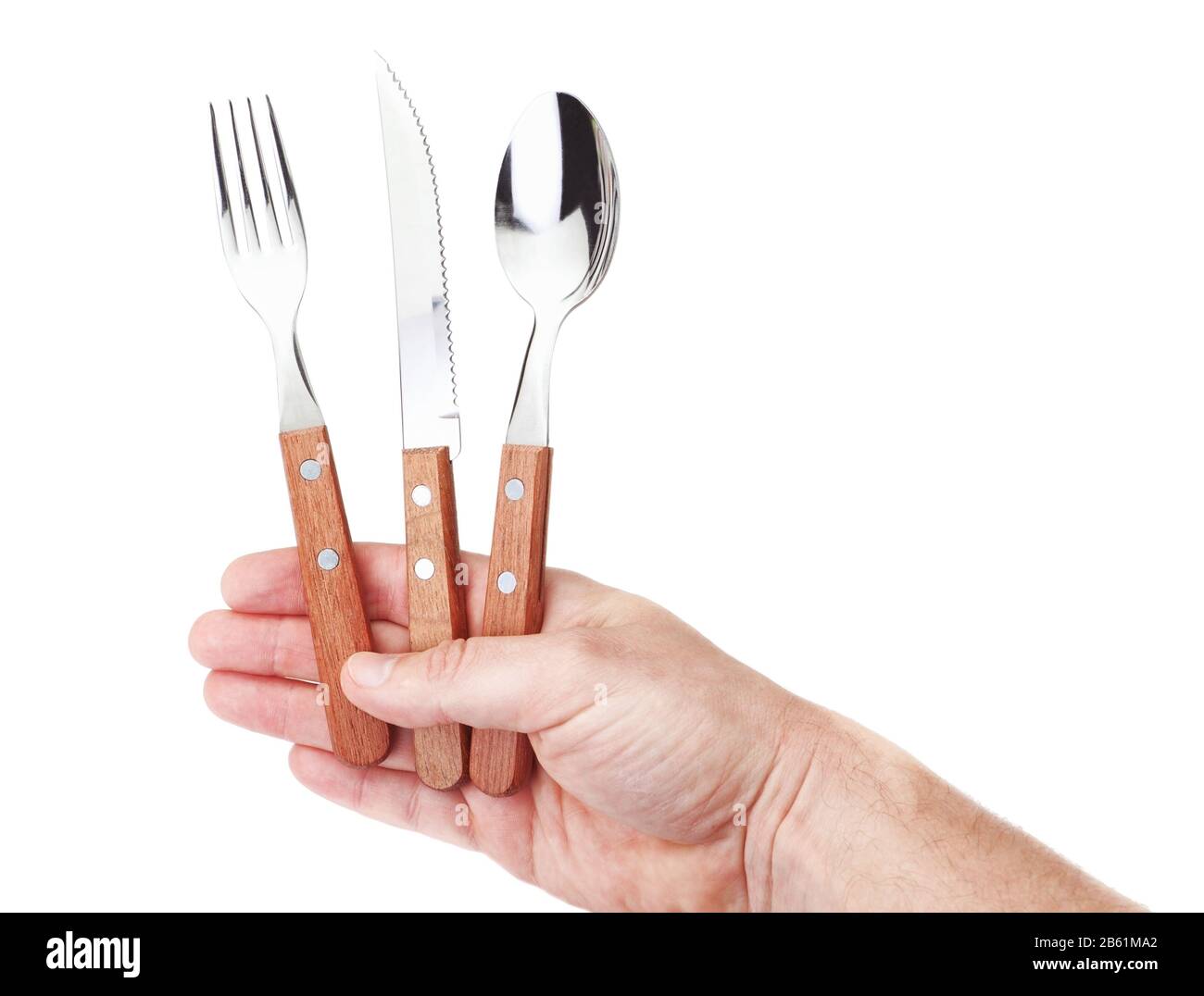 Cutlery in a man's hand. On a white background Stock Photo - Alamy