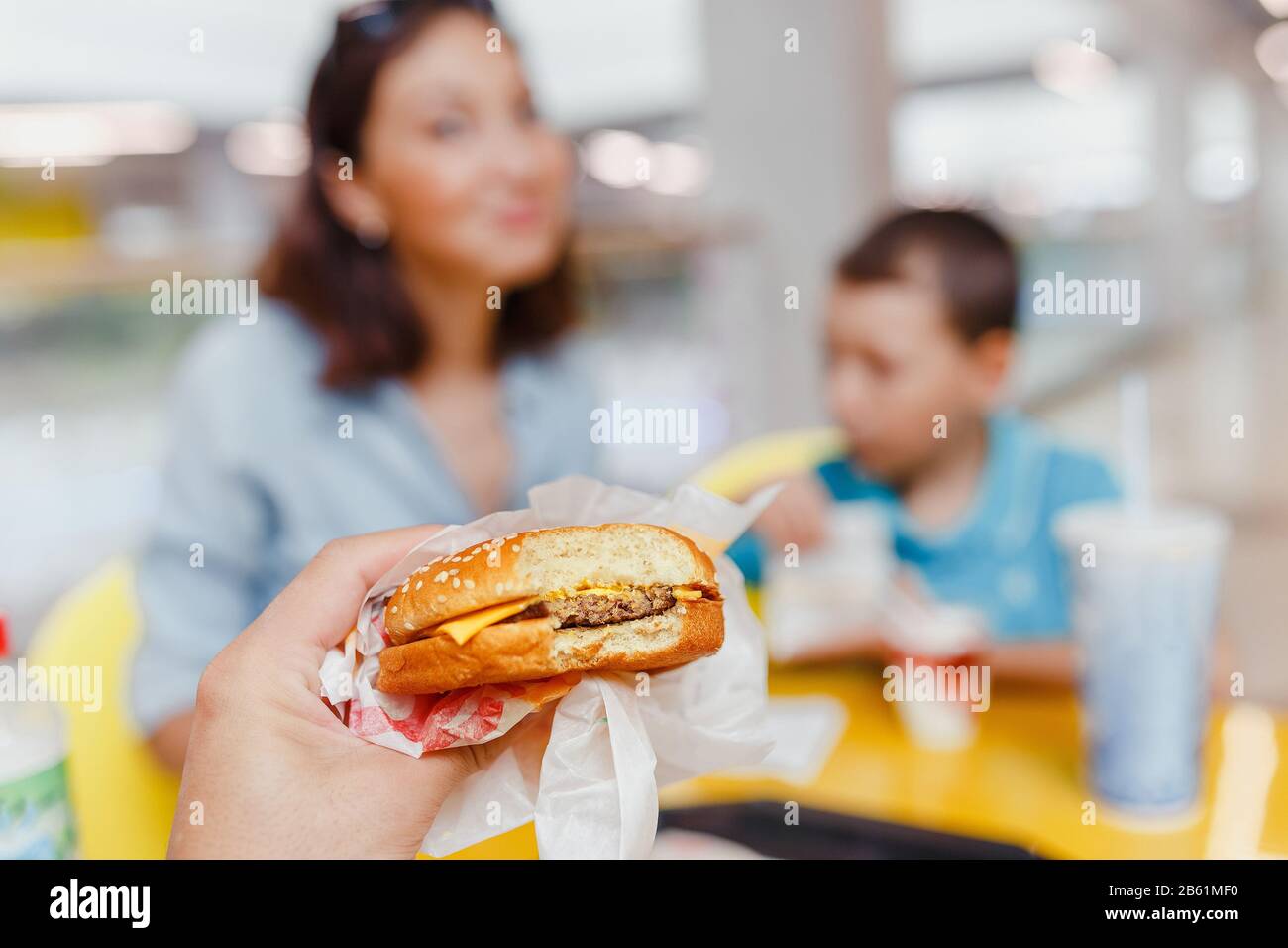 Boy having burger hi-res stock photography and images - Alamy