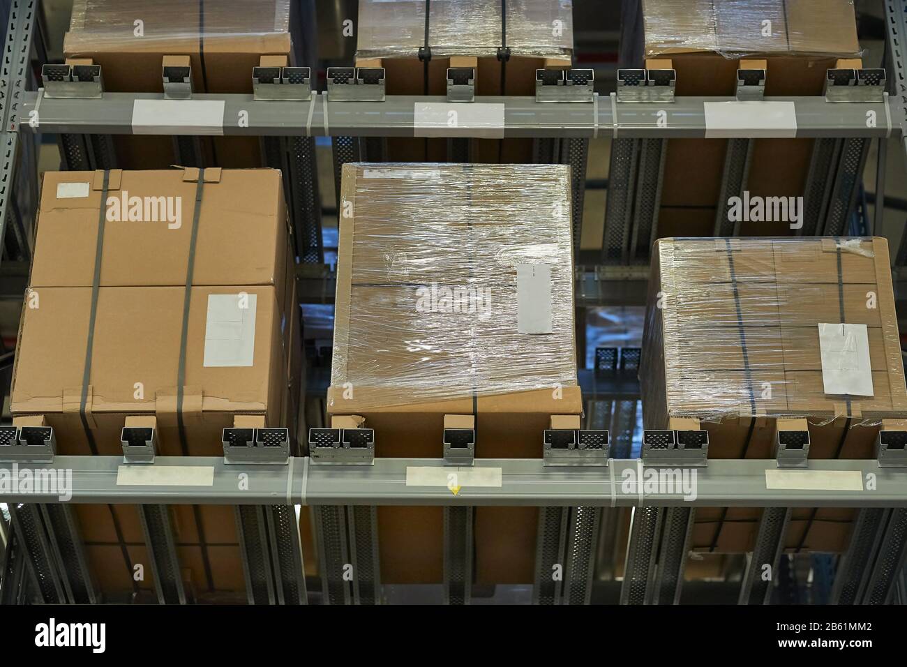 Warehouse with stocked shelves Stock Photo - Alamy