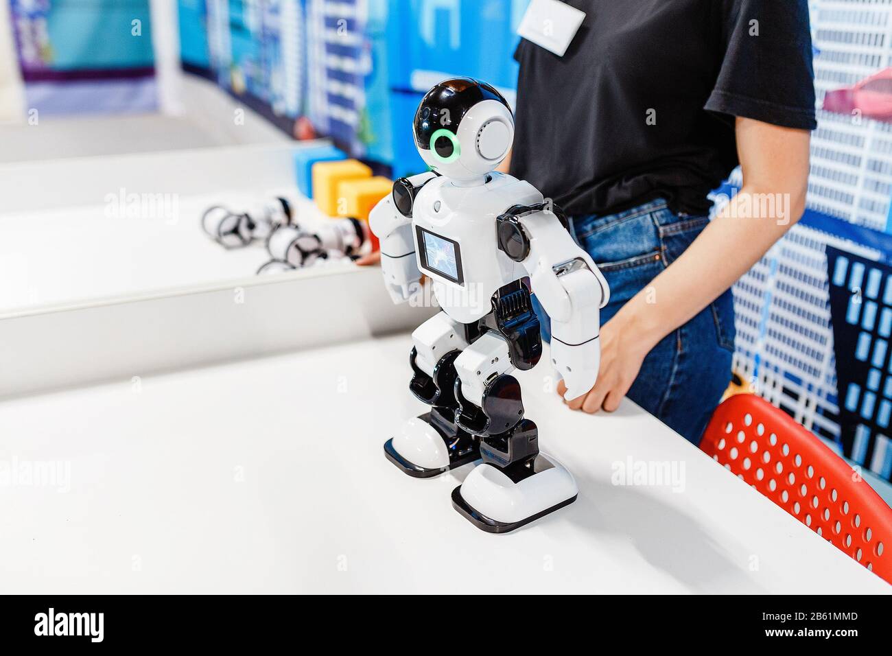 Kid looking at android dancing robot, leisure and science concept Stock ...