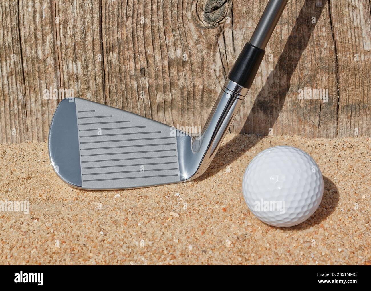 Golf stick and ball support wooden close-up on the sand Stock Photo - Alamy