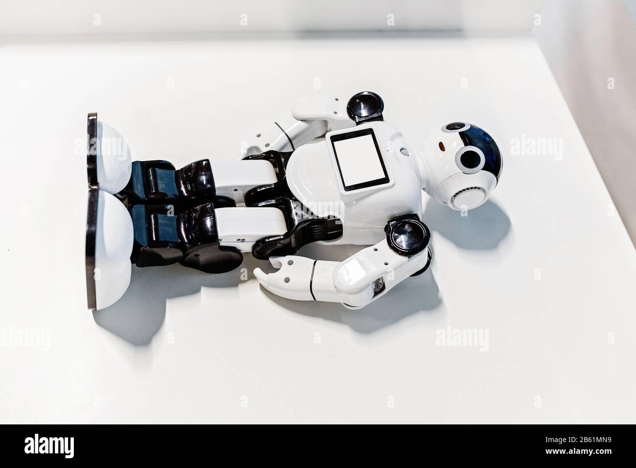 White modern transformer toy robot on white Stock Photo - Alamy