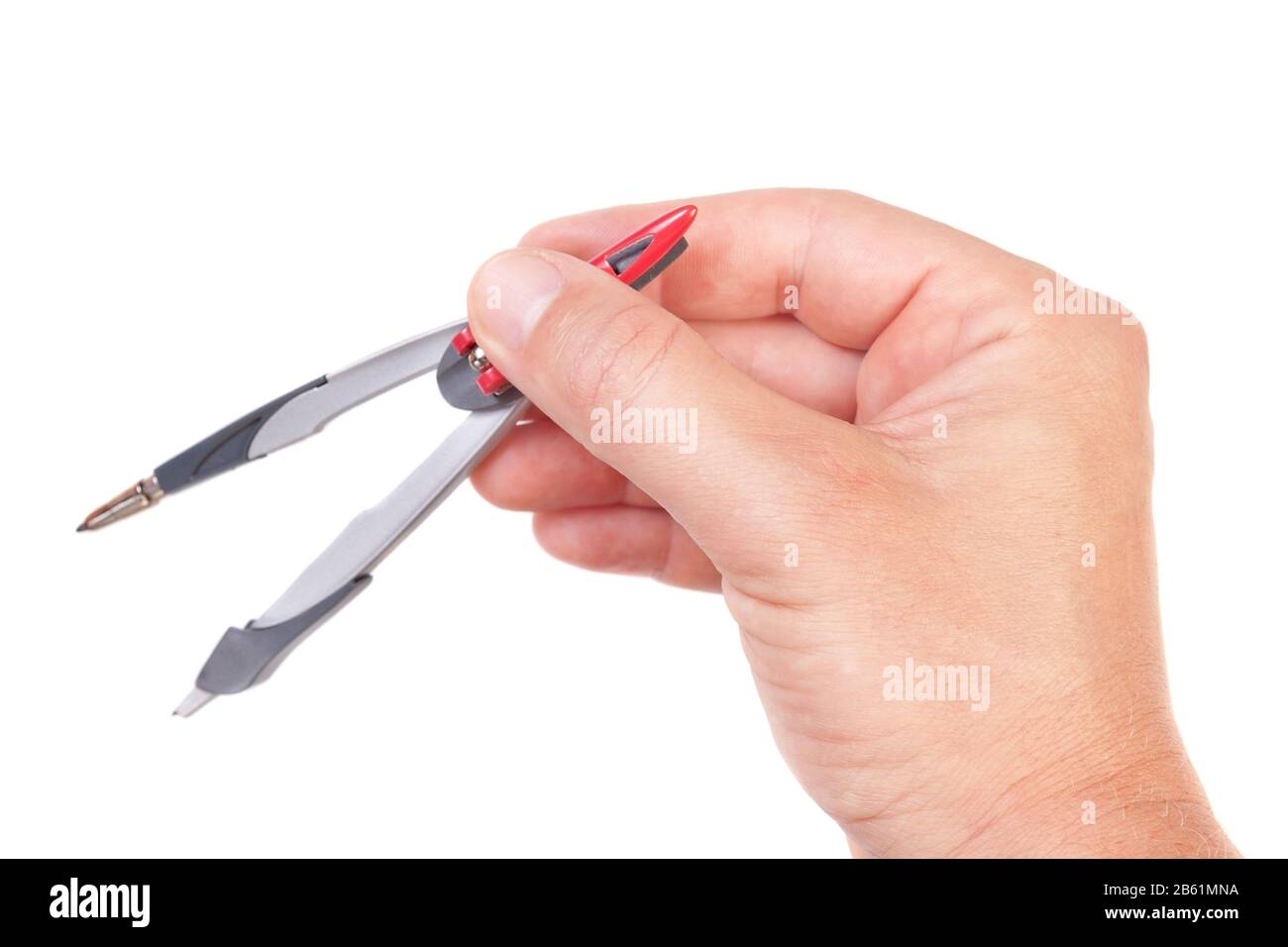 Man's hand holding a geometric compass. On a white background Stock ...