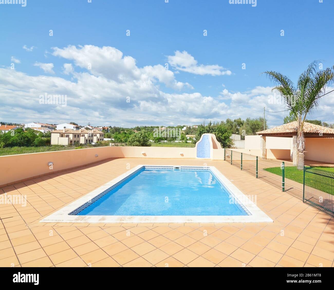 Summer outdoor pool near the palm trees. In the hotel to rest Stock ...
