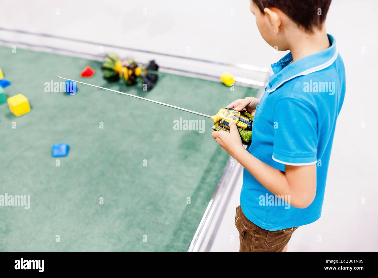 Kid playing with a toy car with wireless radio remote control Stock ...