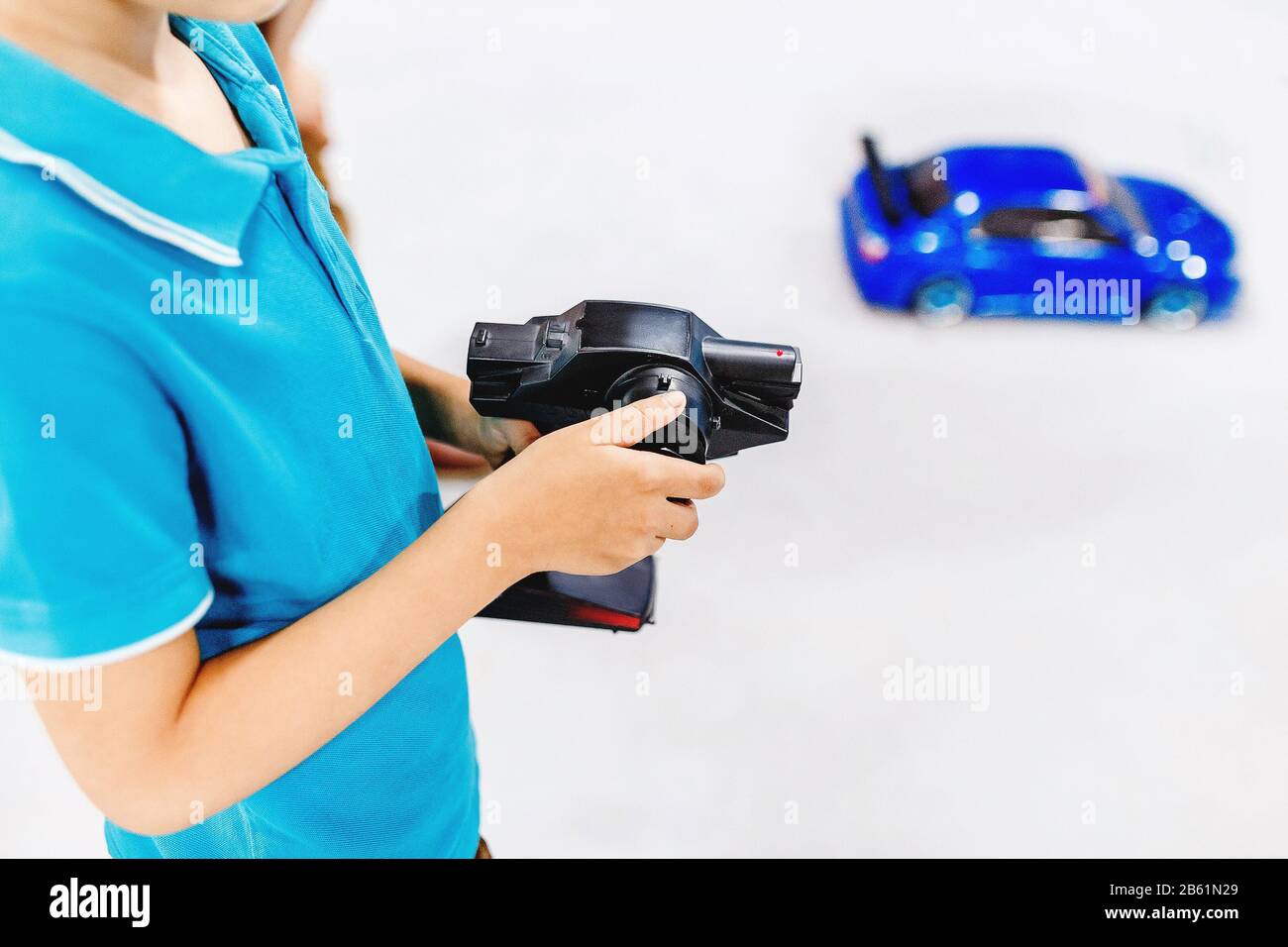 Baby boy playing with remote control hi-res stock photography and ...