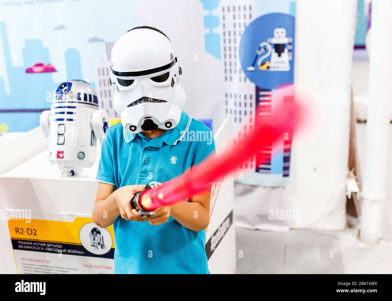 ULTRA MALL, UFA, RUSSIA, 21 AUGUST, 2017: A boy in a mask and suit of a ...
