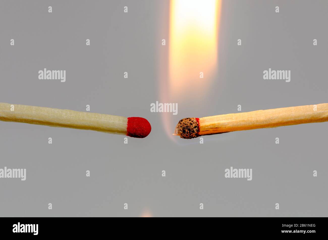 two matches, one ignited and one in original condition Stock Photo - Alamy