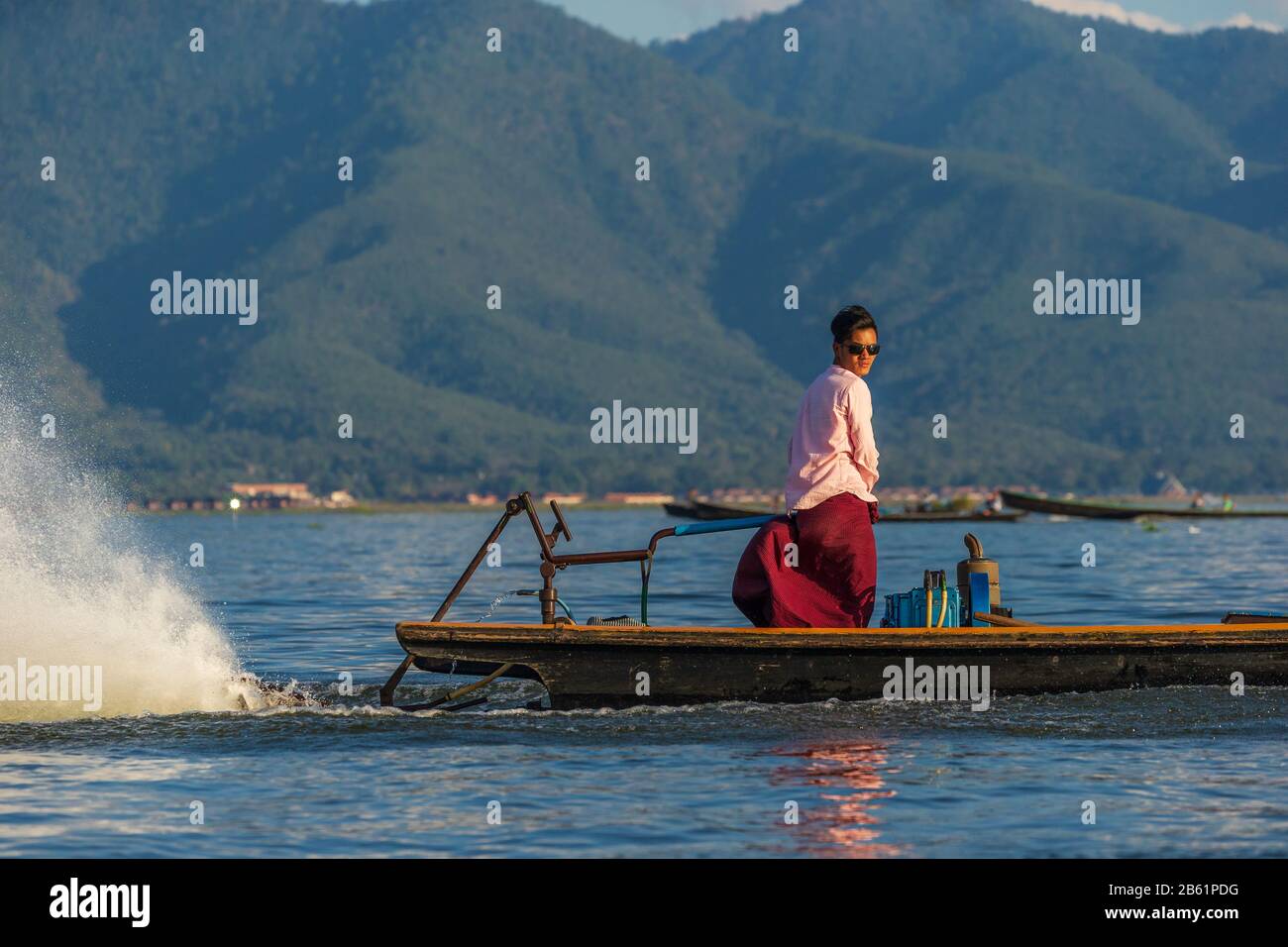 Inle Lake, Myanmar - ca. January 2018: A burmese bolting on a ...