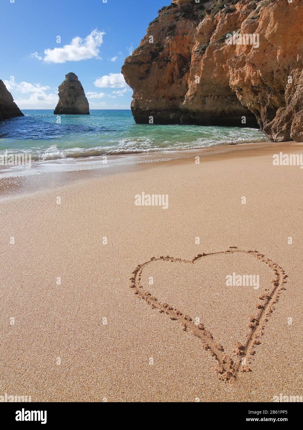 Heart shape in the sand on Valentine's Day Stock Photo - Alamy