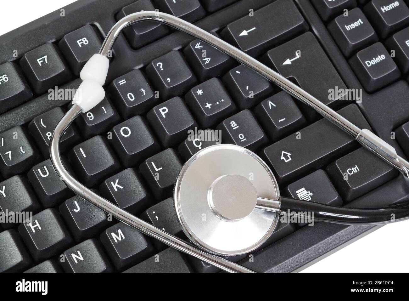 Computer Keyboard for PC and stethoscope as a diagnostic. Close-up ...