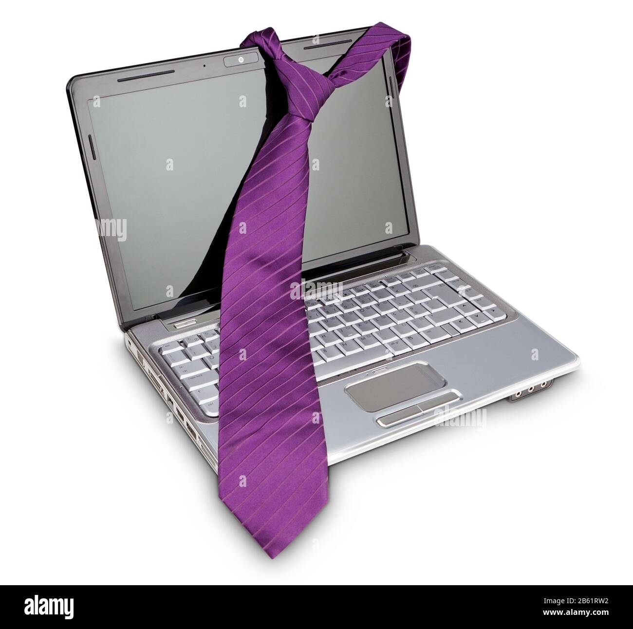 Elegant necktie on a laptop computer as a symbol of fashion. On a white ...