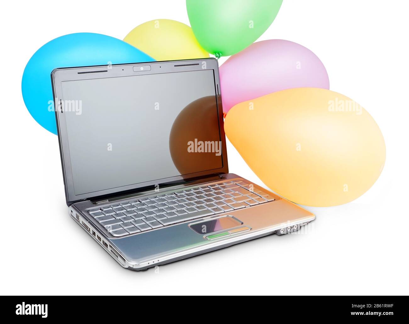 Funny picture carnival rubber balls on a modern laptop. For a birthday ...