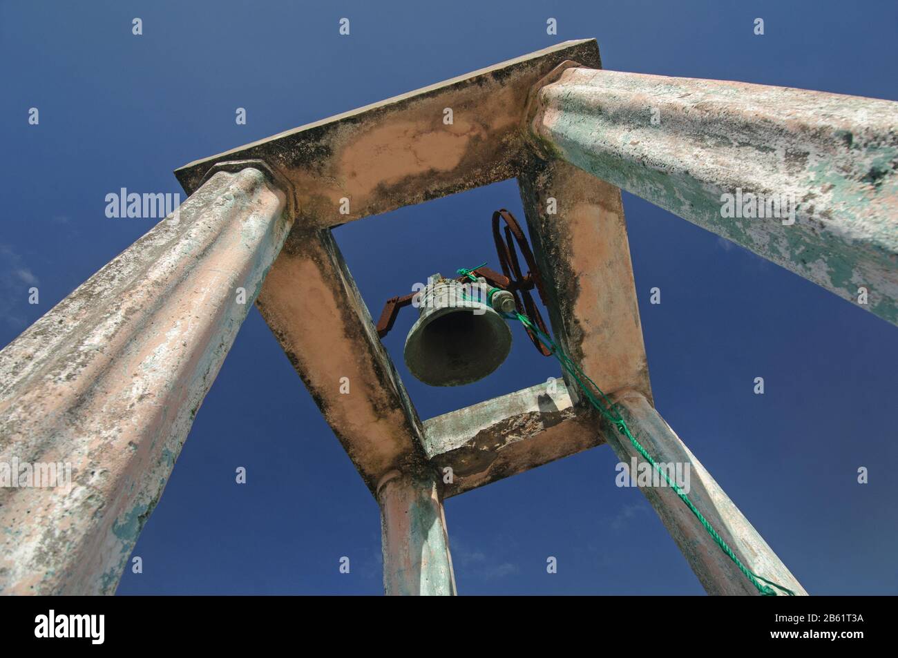 Simple bell-tower against bright blue sky background Stock Photo - Alamy