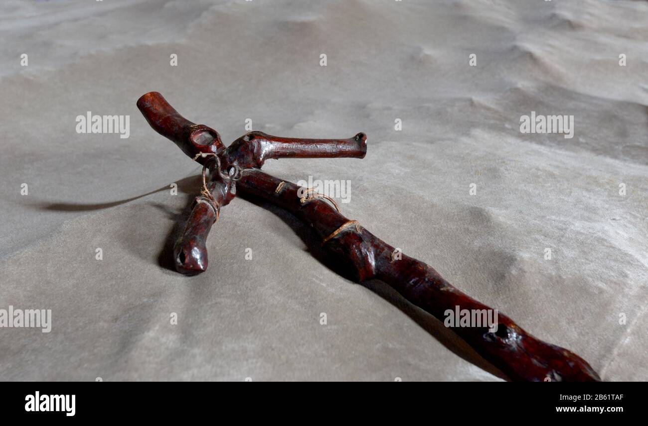 Old cross on the grey cloth. The Grapevine Cross also known as the ...