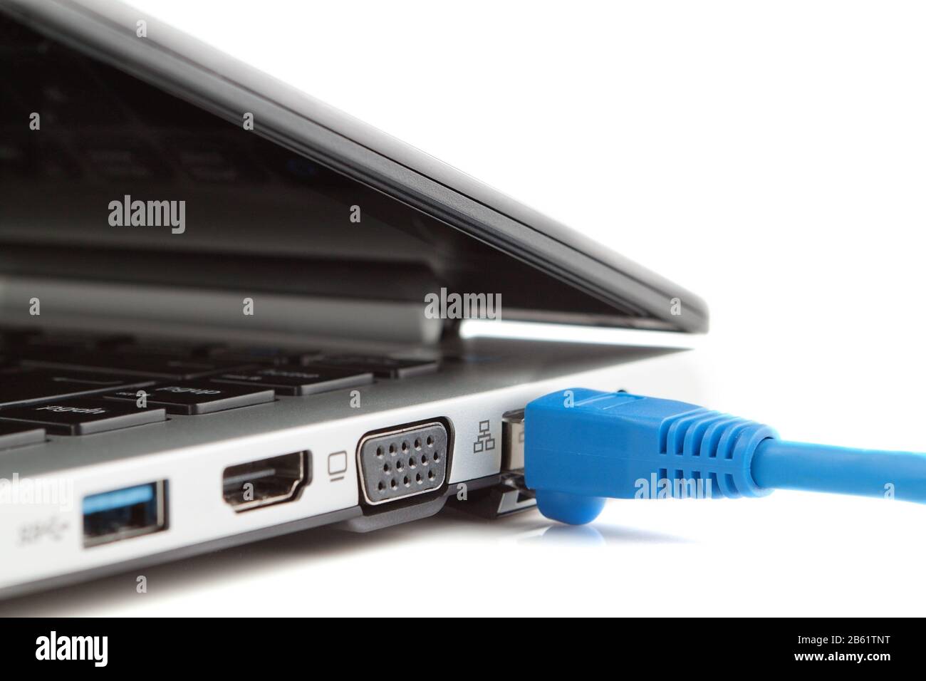 Modern laptop with an internet cable close-up Stock Photo - Alamy