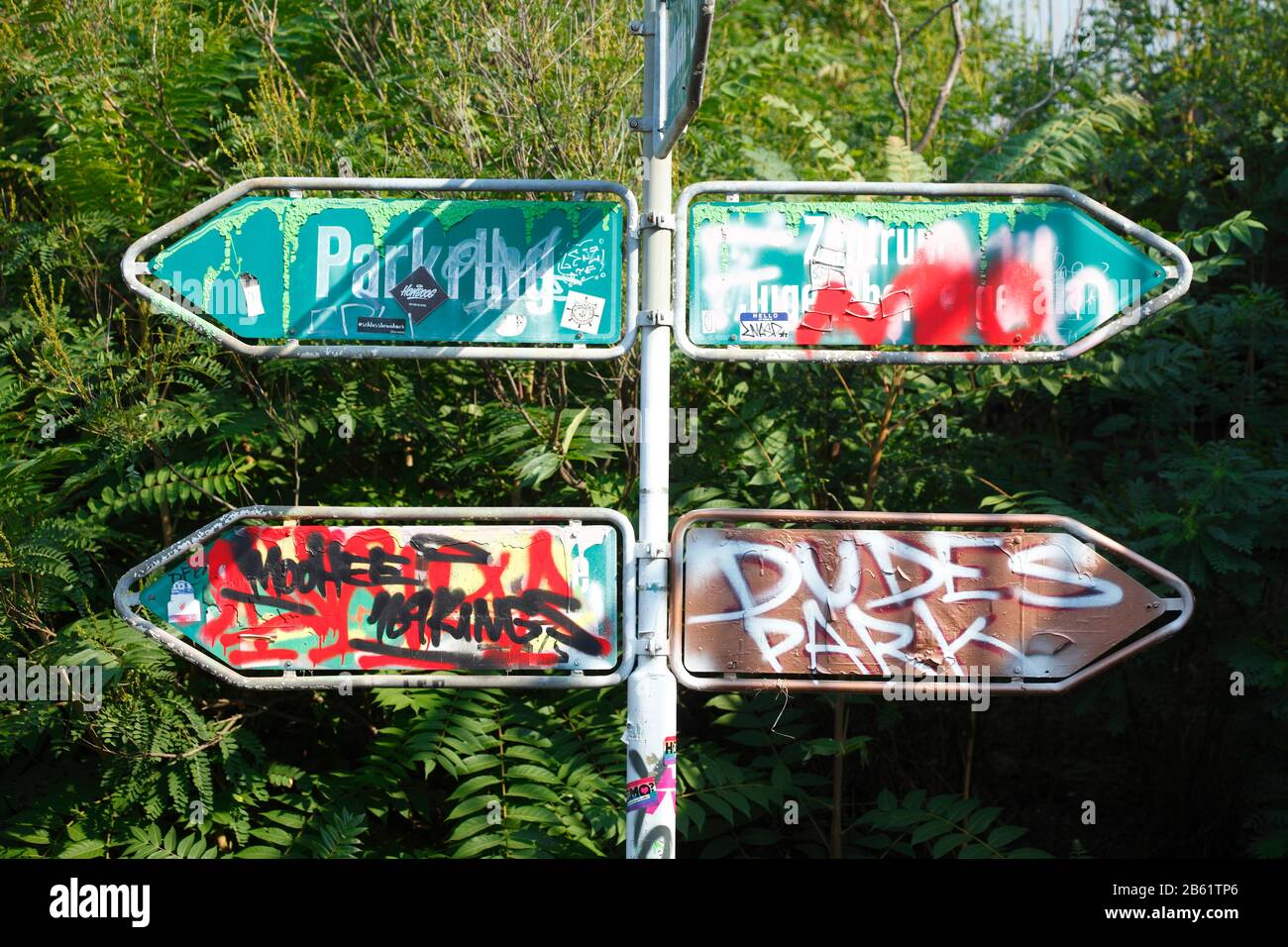 Colorful arrow signs smeared with paint, Germany, Europe Stock Photo ...