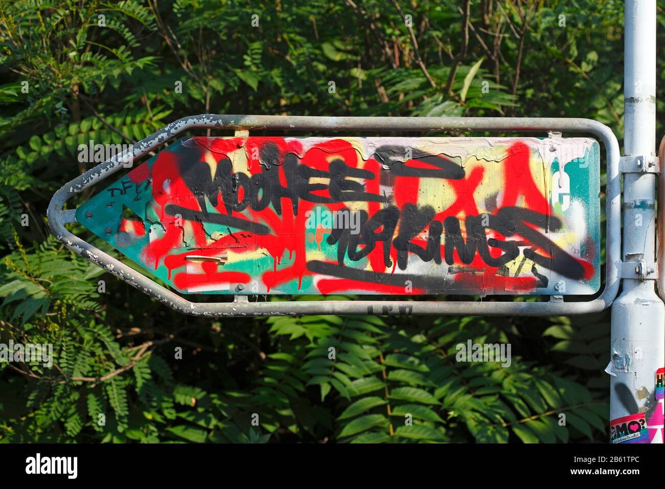 Colorful arrow signs smeared with paint, Germany, Europe Stock Photo ...