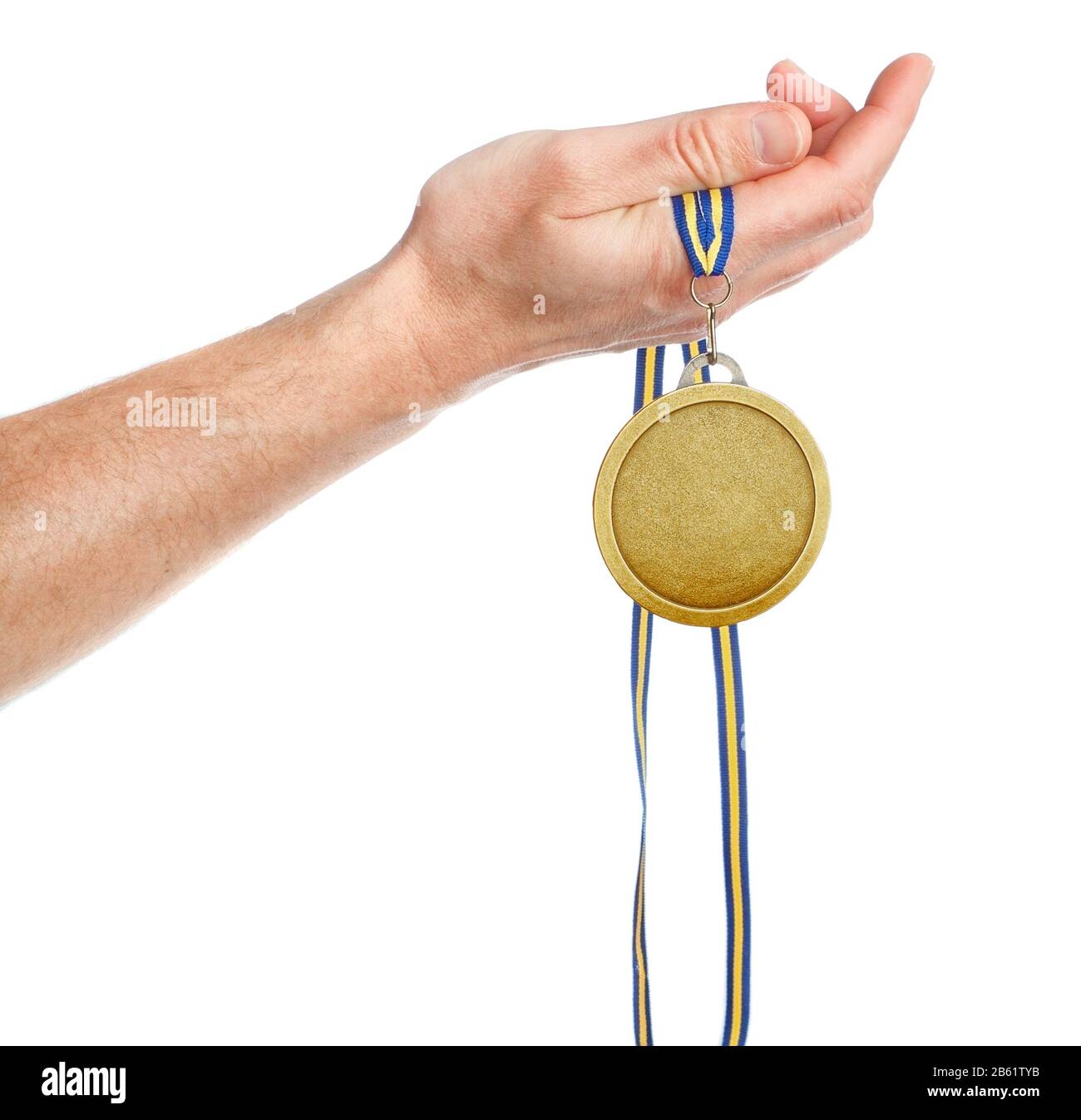Gold medal winner in the hand. On a white background Stock Photo - Alamy